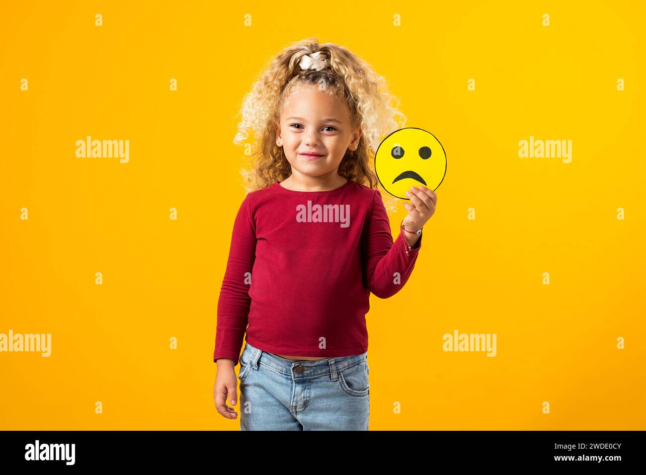 Girl Holding Sad and Happy Emoticons. Children's Emotional Balance ...