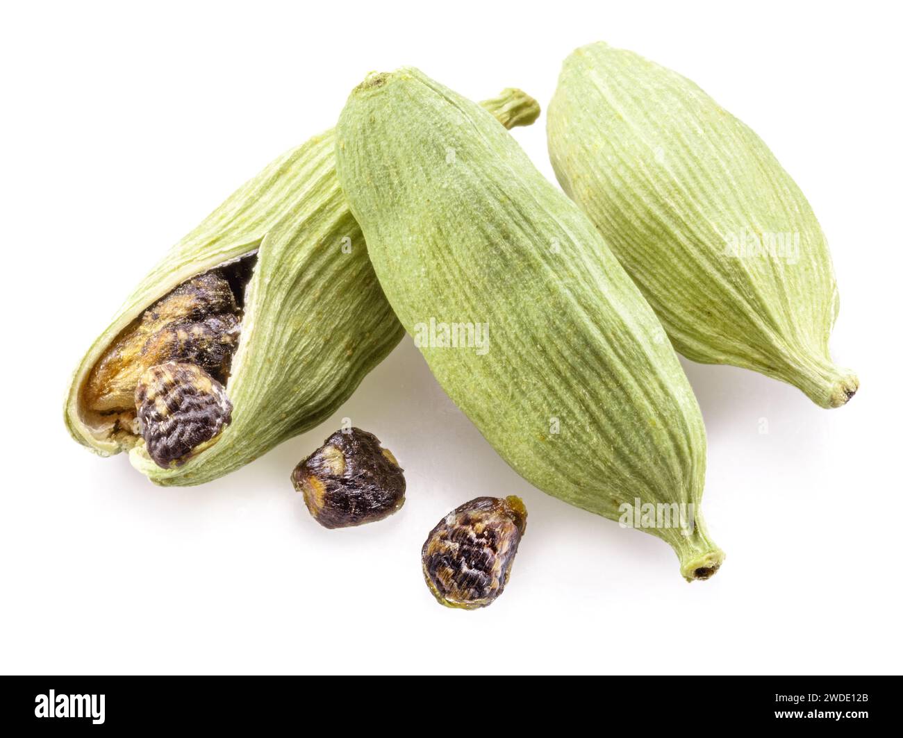Seeds of cardamom spices isolated on a white background, mulled wine ...