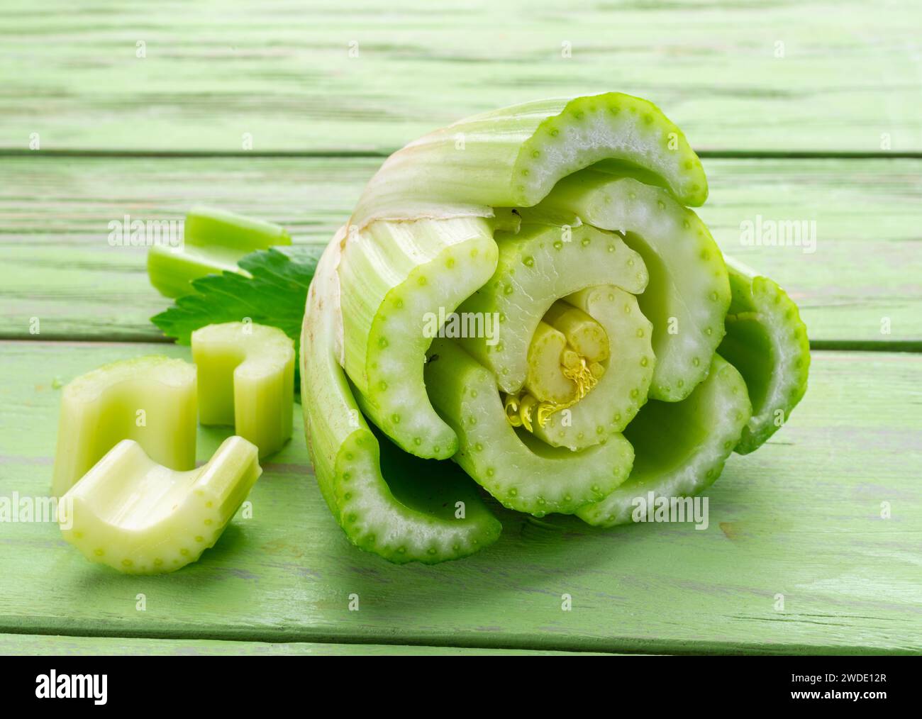 Pile of celery ribs isolated on white background Stock Photo - Alamy