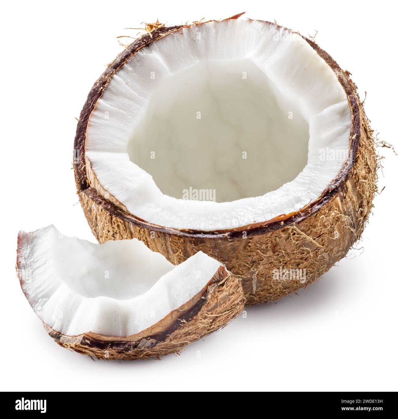 Cracked coconut fruit with piece of coconut on white background. File ...