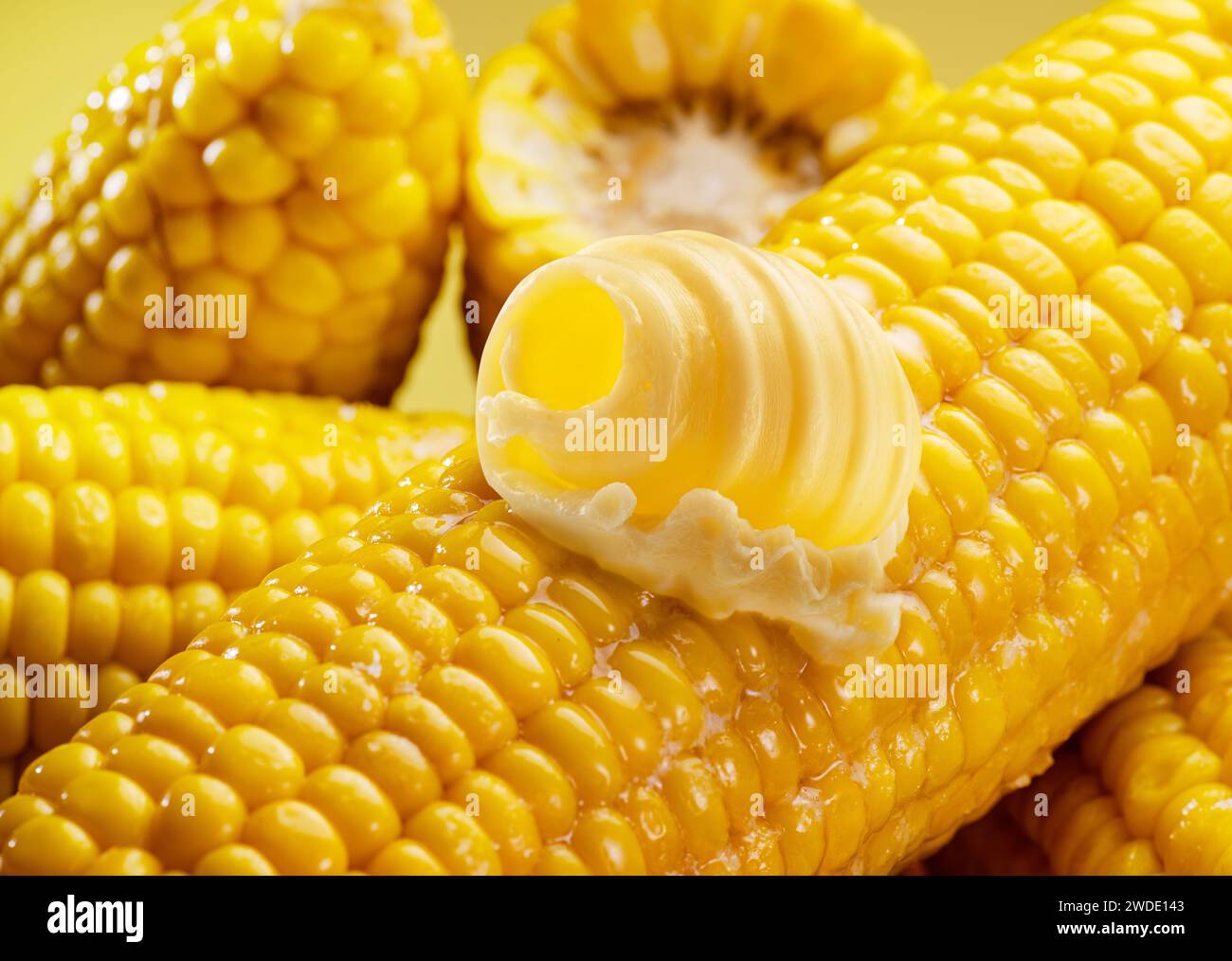 Ripe corn heads with corn whiskers and leaves. Nice vegetable cooking ...