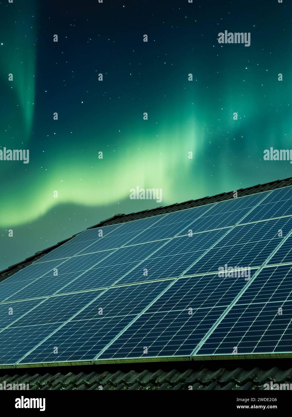 Solar panels producing clean energy on a roof of a residential house ...