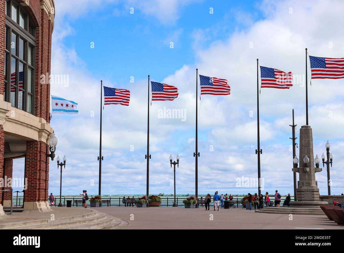 Navy Pier, Chicago's waterfront boardwalk lined with American flags and ...