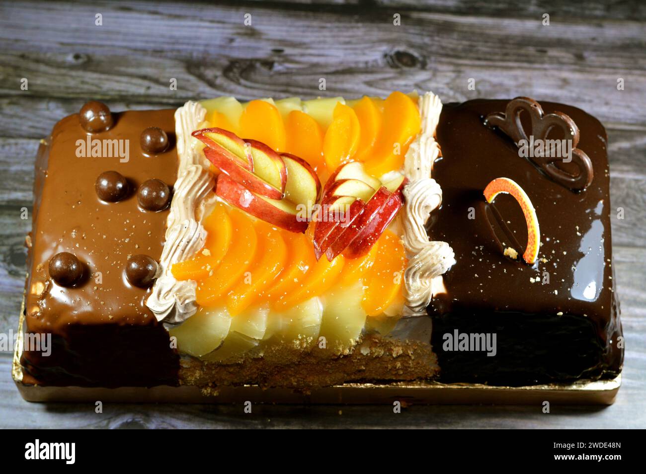 Birthday cake of three different pieces spongy creamy cake for ...