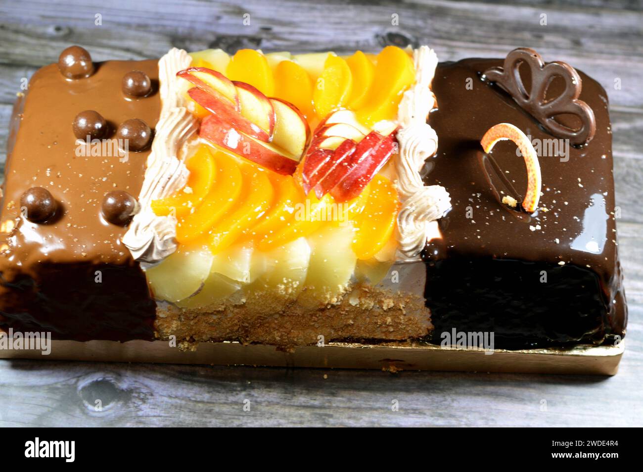 Birthday cake of three different pieces spongy creamy cake for ...