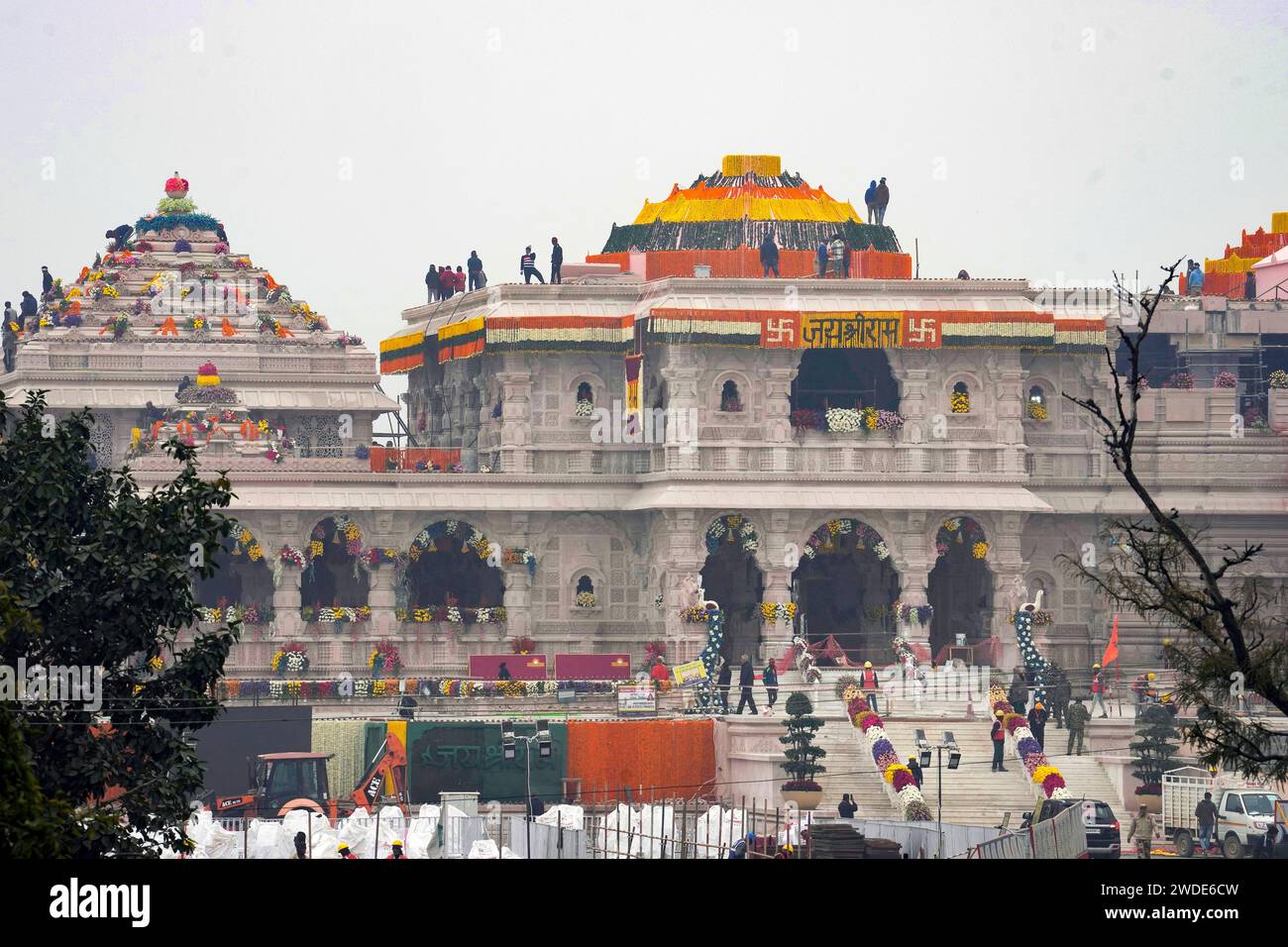 Workers decorate a temple dedicated to Lord Ram two days before its ...