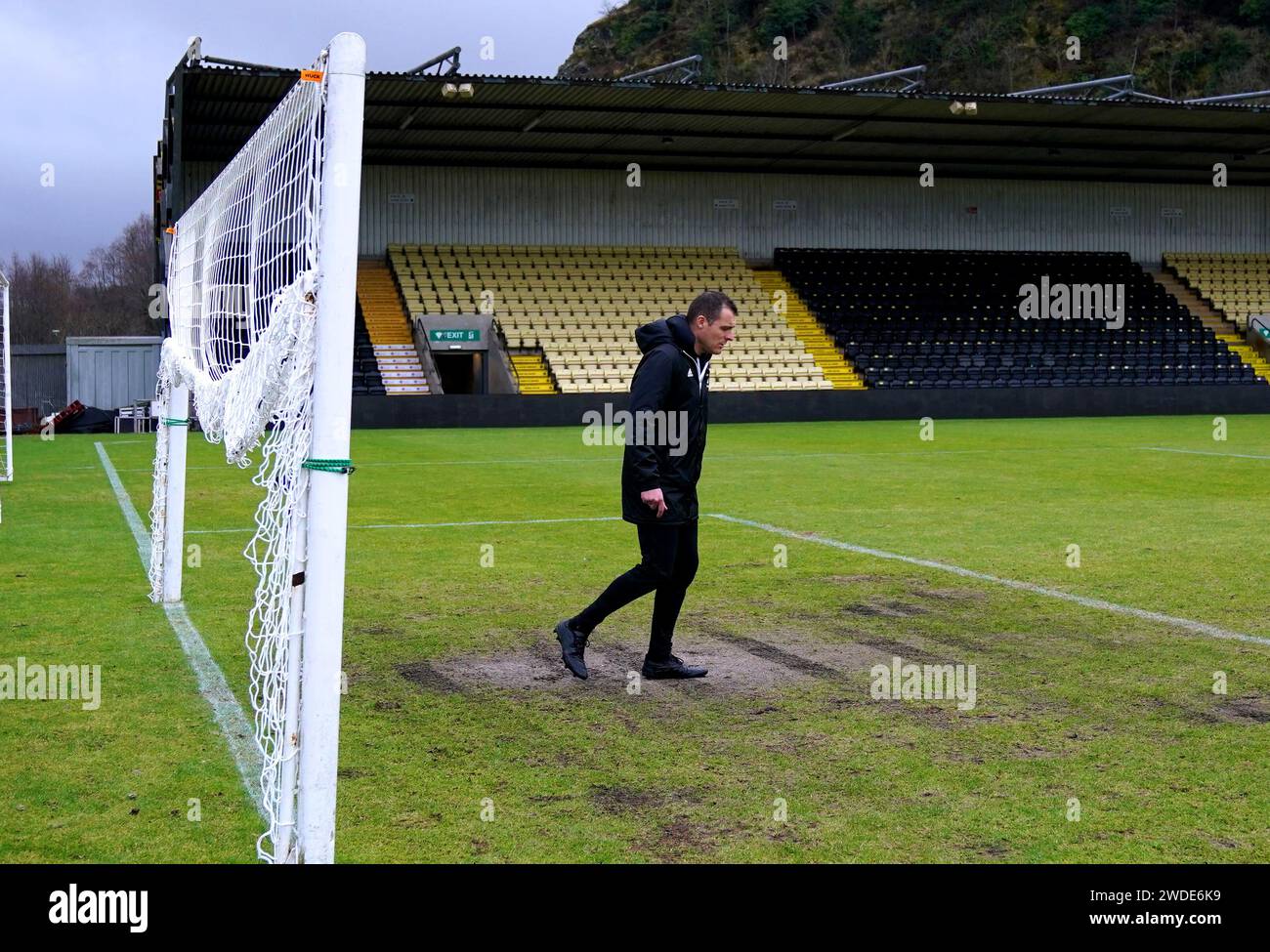Referee Euan Anderson inspects the pitch ahead of the Scottish Gas ...