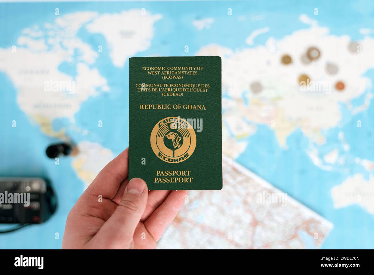 Ghana passport in hand Stock Photo - Alamy