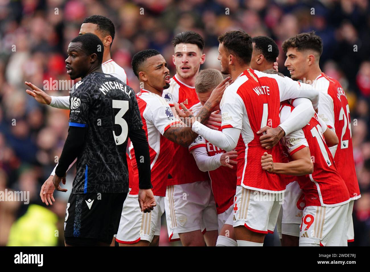 Arsenal players celebrate after an own goal by Crystal Palace ...