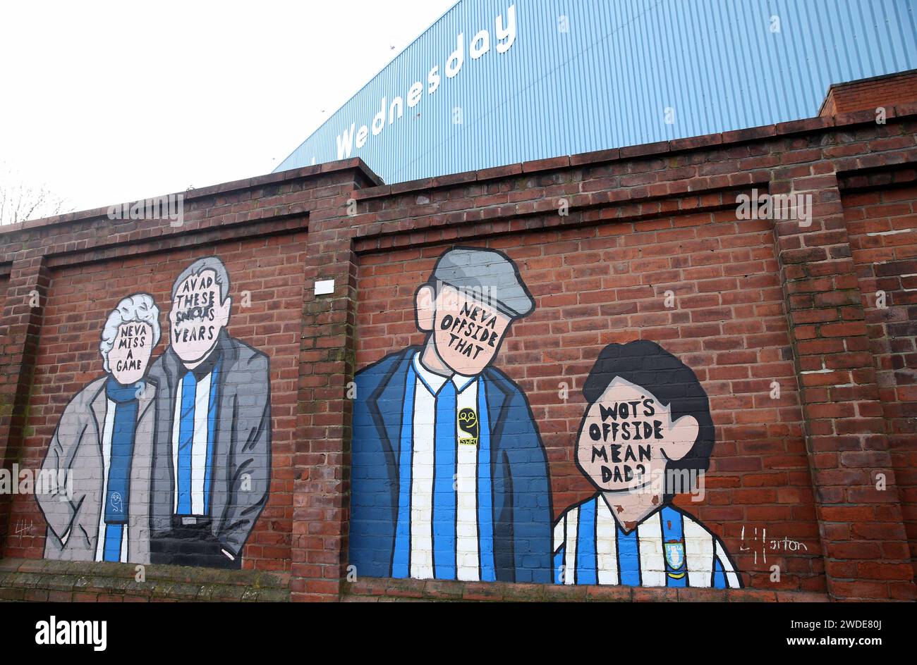Football themed murals on a wall outside the ground before the Sky Bet ...