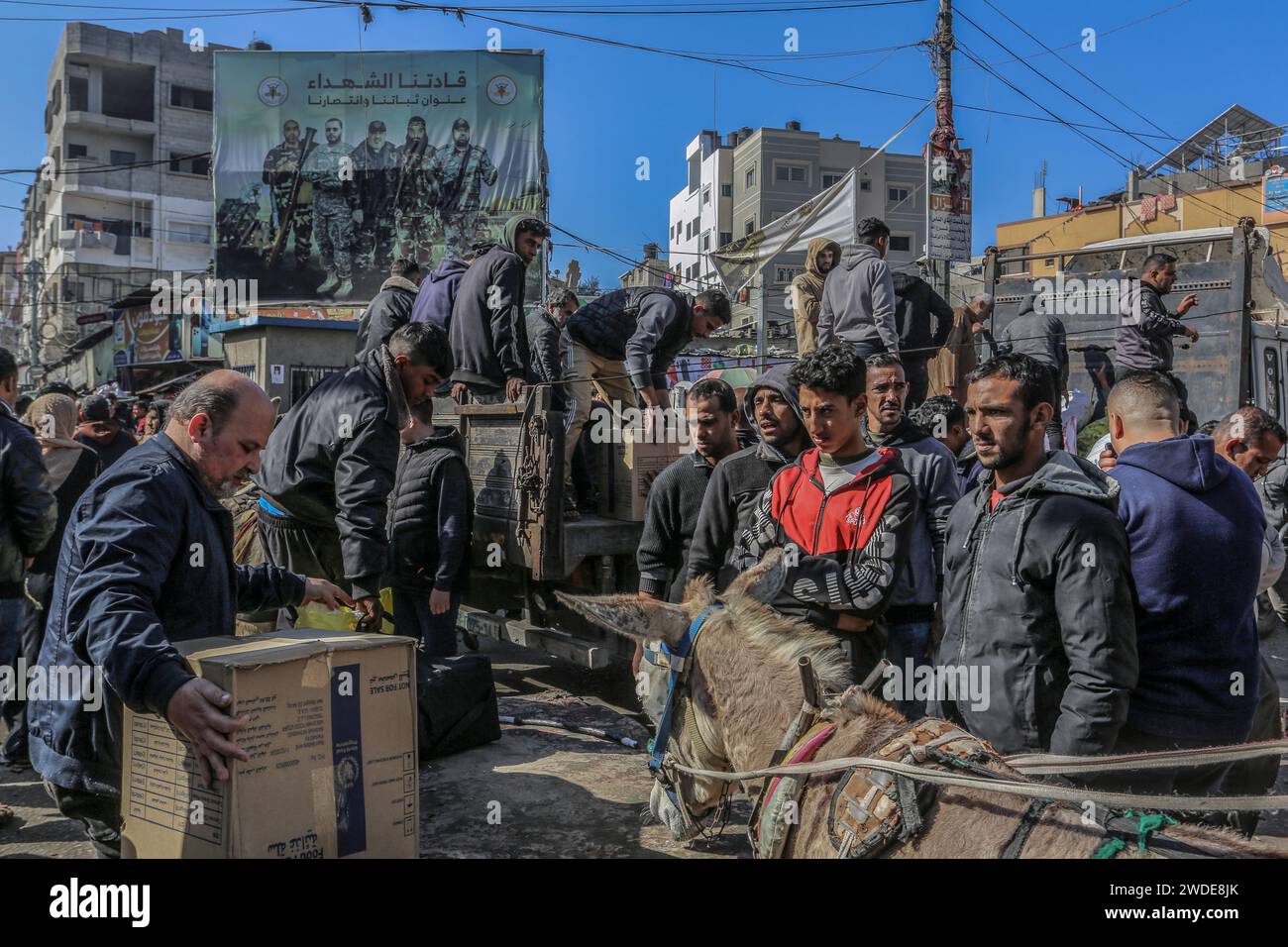 Rafah, Palestinian Territories. 20th Jan, 2024. Palestinians crowd at a ...