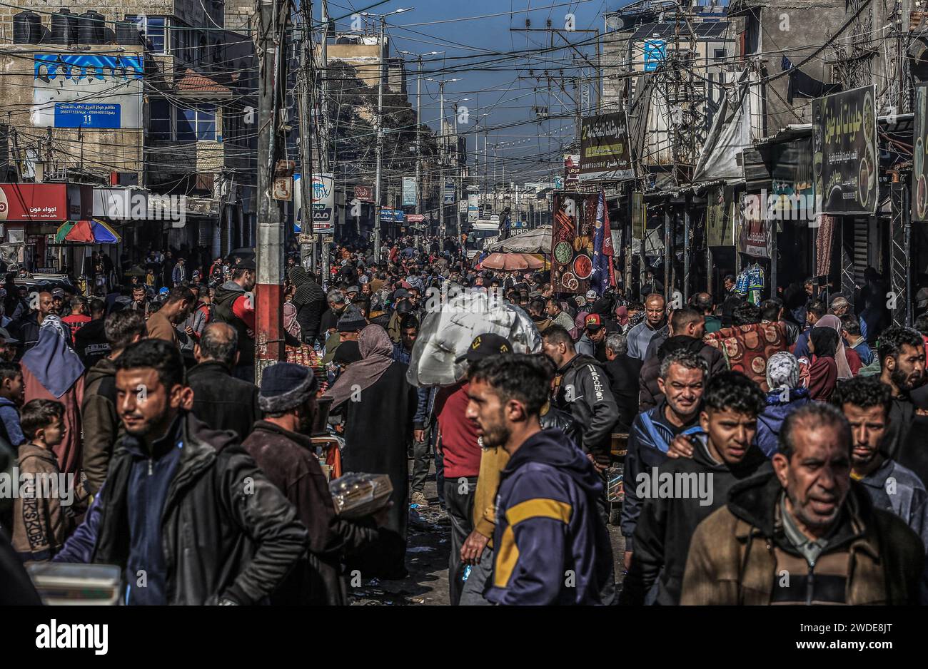 Rafah, Palestinian Territories. 20th Jan, 2024. Palestinians crowd at a ...