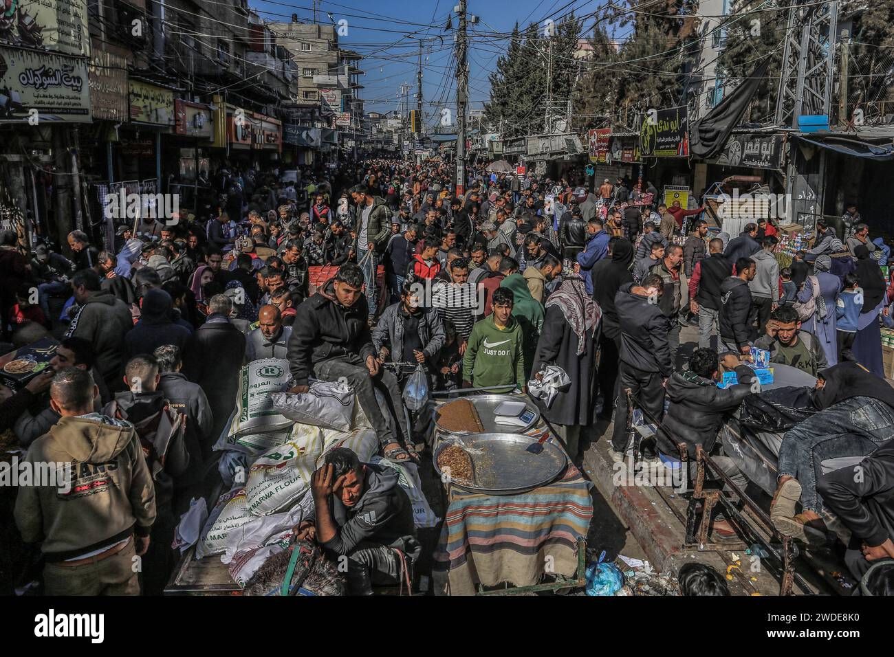 Rafah, Palestinian Territories. 20th Jan, 2024. Palestinians crowd at a ...