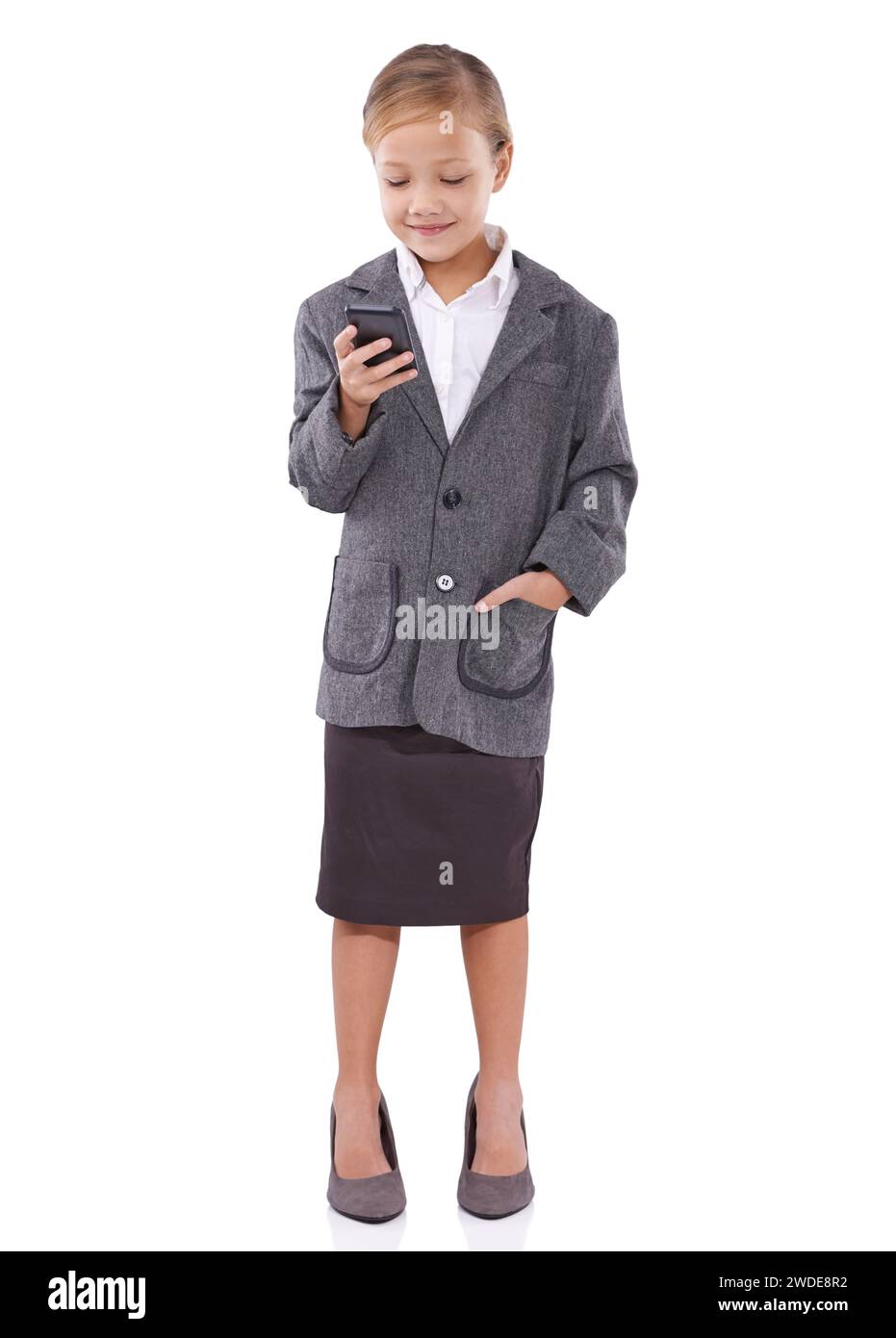 Child, business and typing an email on phone in studio communication ...