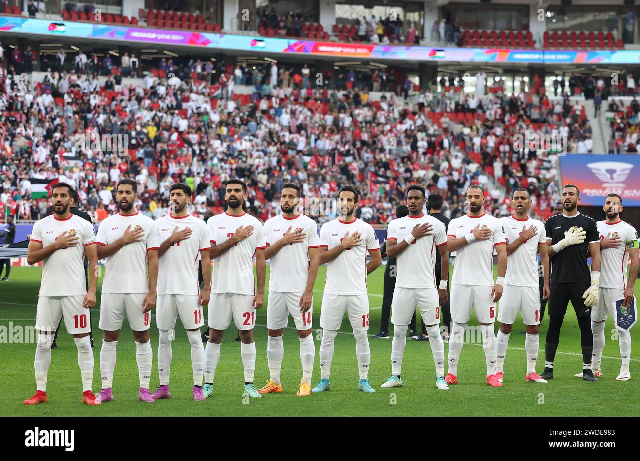 Doha, Qatar. 20th Jan, 2024. Starting players of Jordan line up before ...