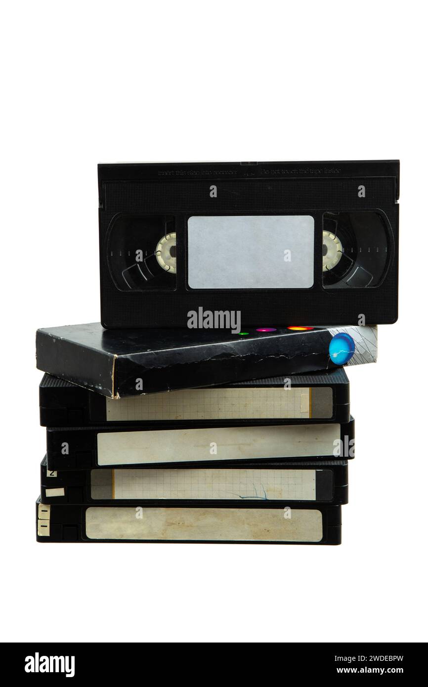 Pile of VHS video cassettes. Vintage media. Isolate on a white ...