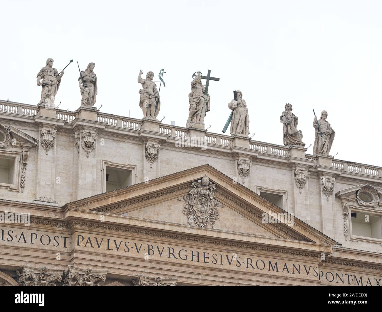 Statues on top of the front facade of St Peter's basilica, Vatican city ...