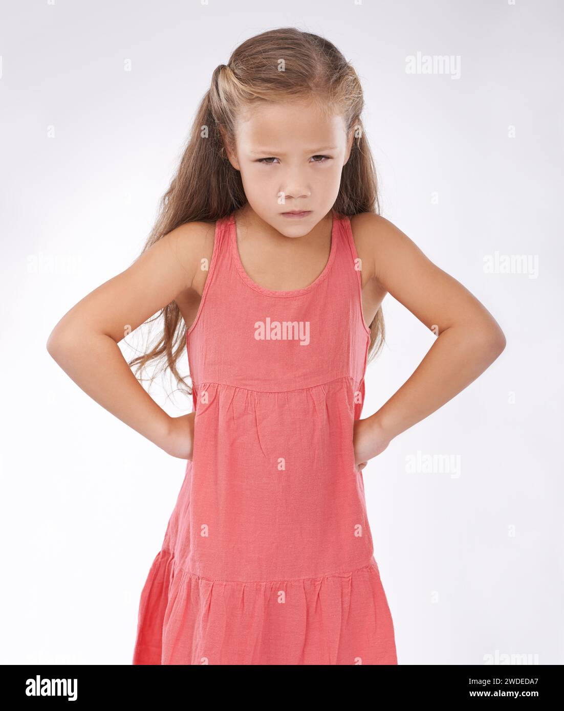 Portrait, unhappy or tantrum and girl child in studio on white ...