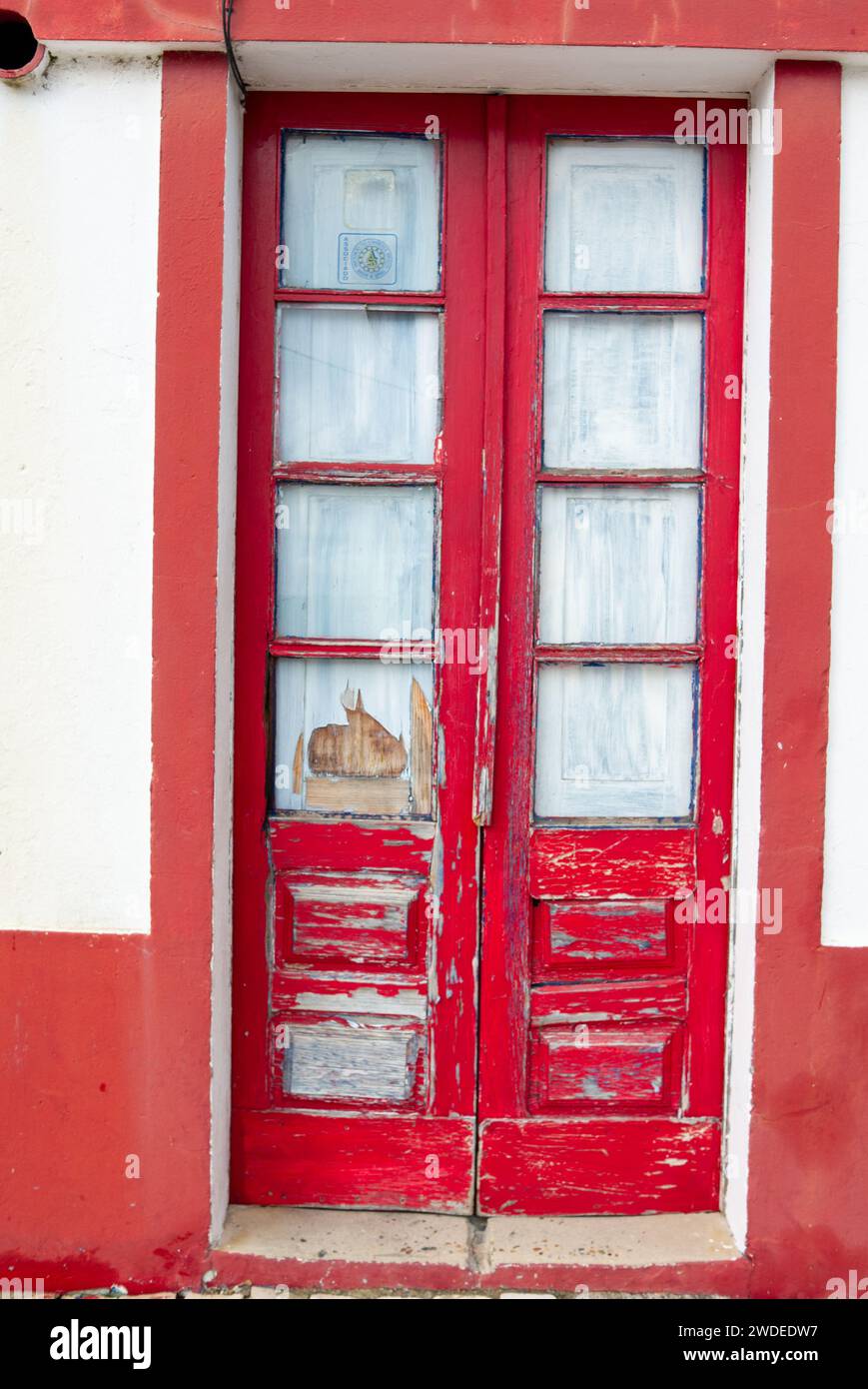 Old red door in Alcácer do Sal, Portugal Stock Photo - Alamy