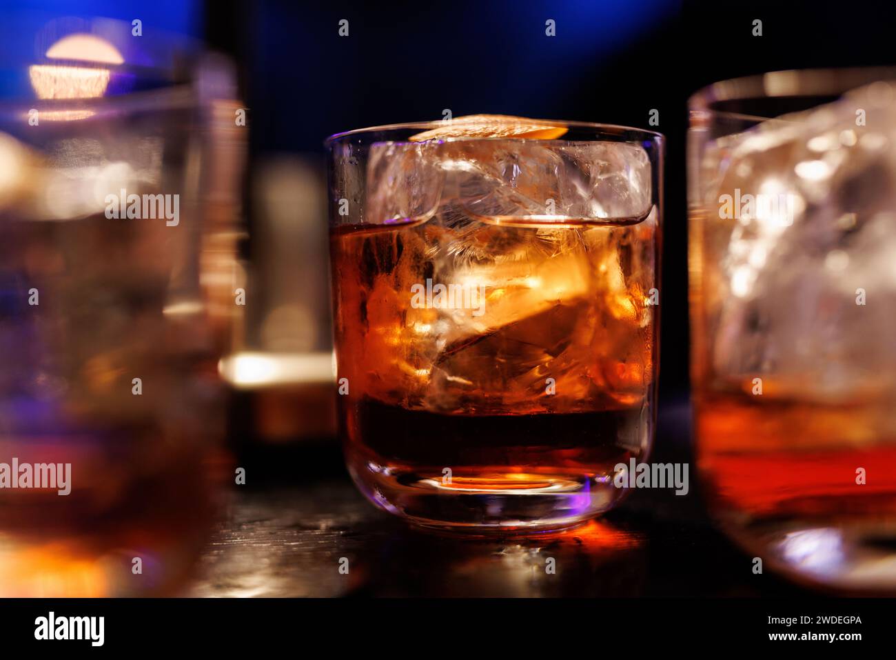 A glass of whiskey on the bar counter Stock Photo - Alamy