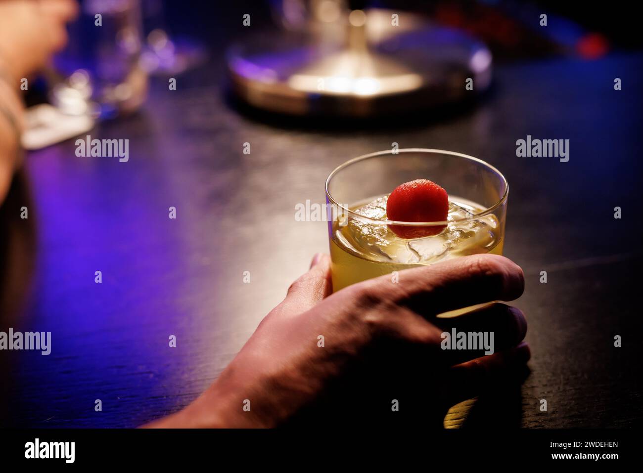 Alcohol cocktail drink in the hand Stock Photo - Alamy