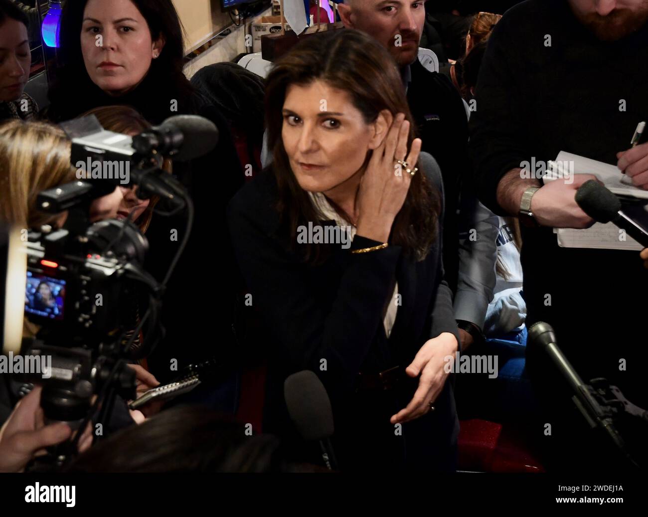 Former U.N. Ambassador Nikki Haley listens to a reporter's question ...