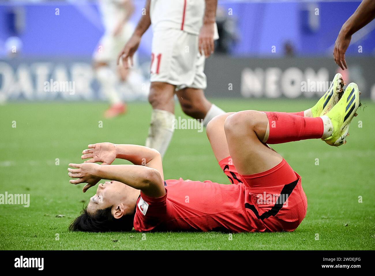 Doha, Qatar. 20th Jan, 2024. Lee Kangin of South Korea reacts during the Group E match between ...