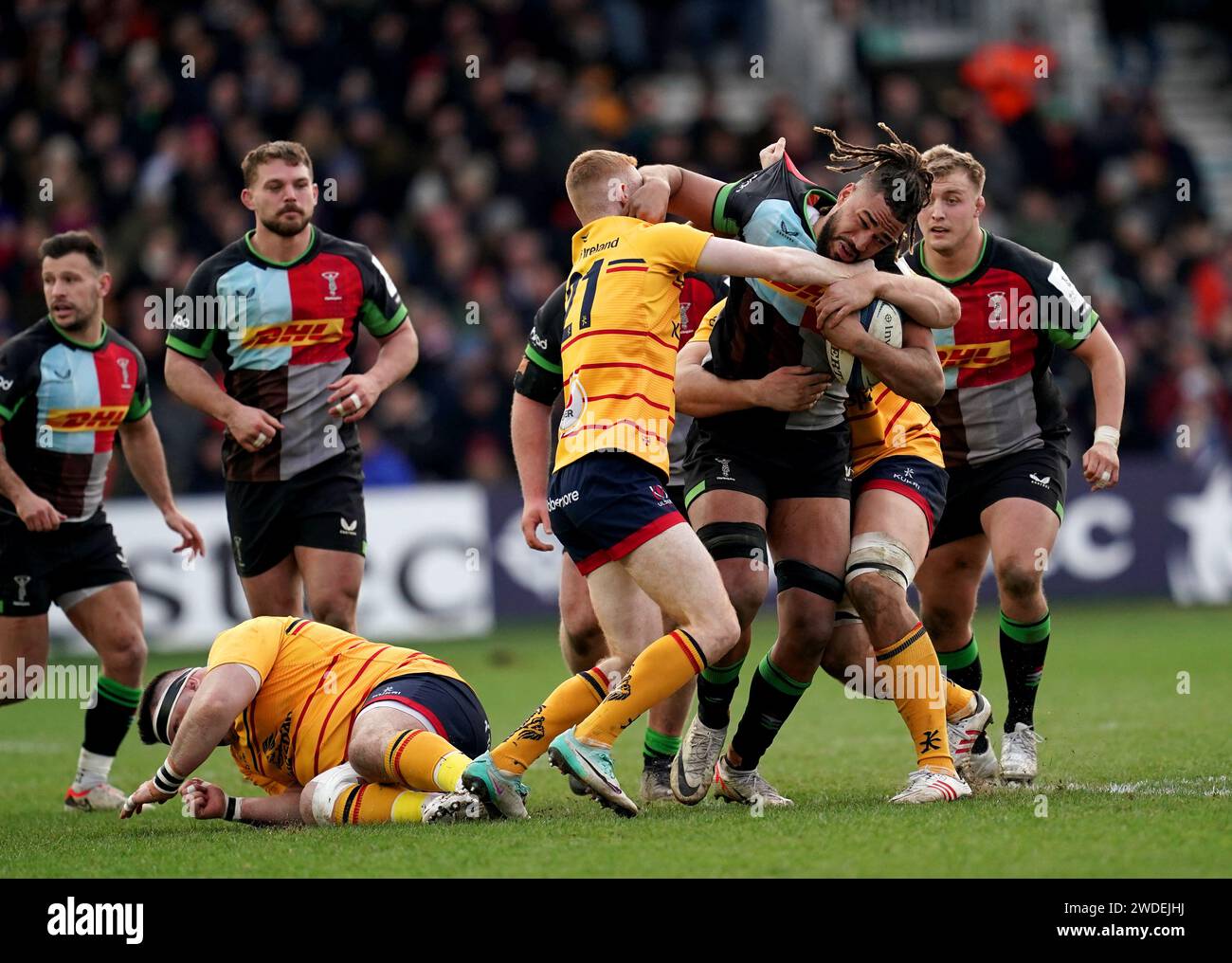Harlequins' Chandler Cunningham-South is tackled by Ulster Rugby's ...