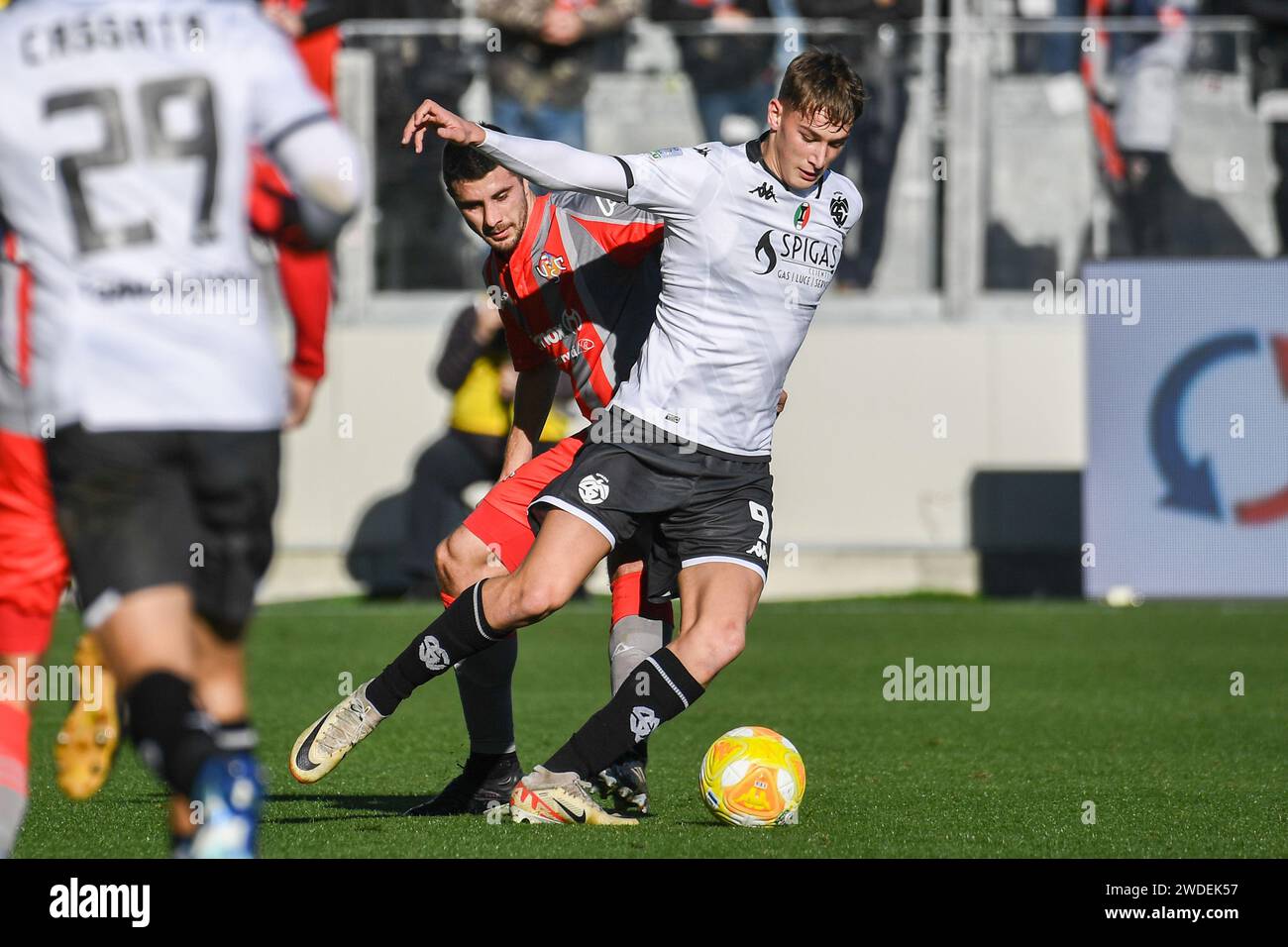 La Spezia, Italy. 20th Jan, 2024. Michele Collocolo (Cremonese) fights for the ball against ...