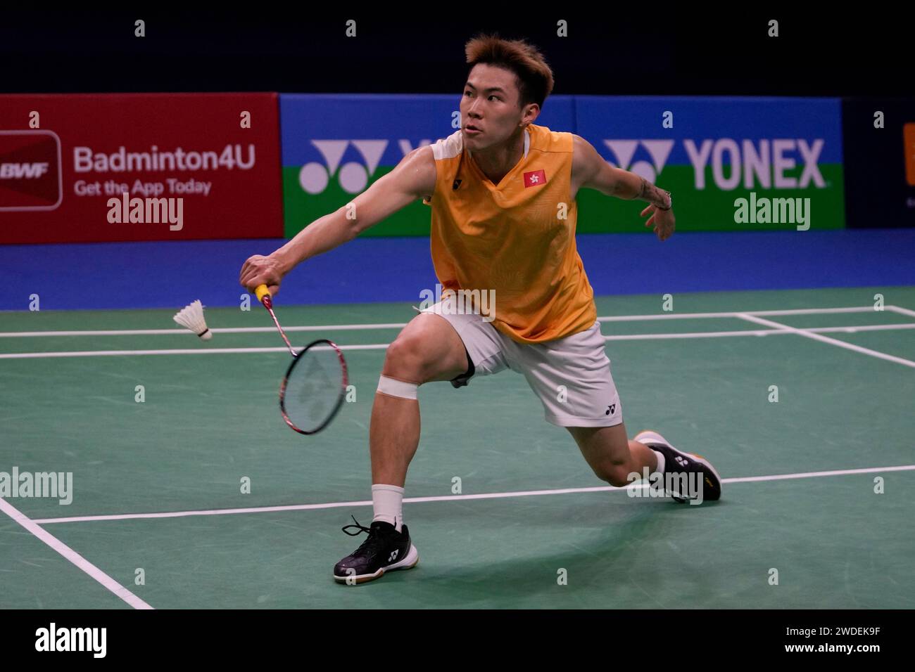 Singapore's Lee Cheuk Yiu returns a shot as he competes against Japan's ...