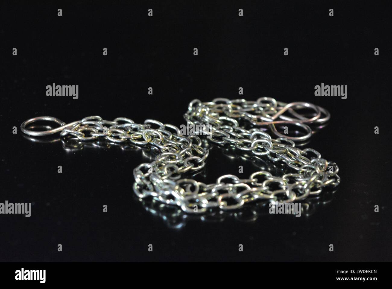 Home furnishings, metal chains of different types and styles arranged ...