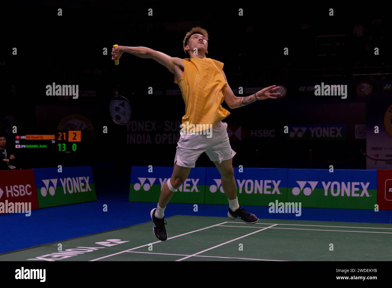 Singapore's Lee Cheuk Yiu smashes as he competes against Japan's Kodai ...