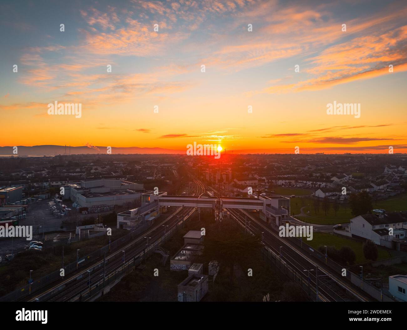 Sunset over Howth Junction & Donaghmede station Stock Photo - Alamy
