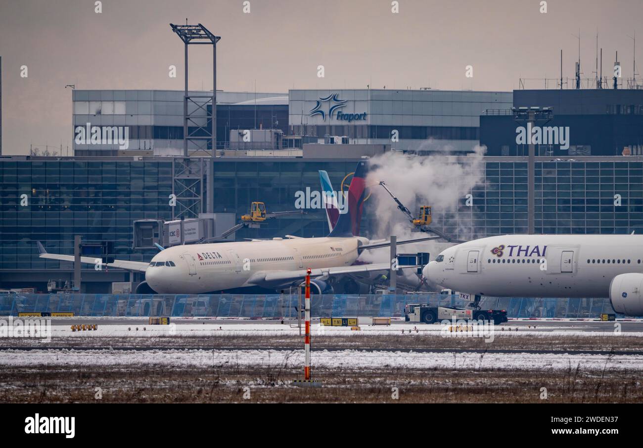 Winter at Frankfurt Main Airport, FRA, Delta aircraft being de-iced at ...