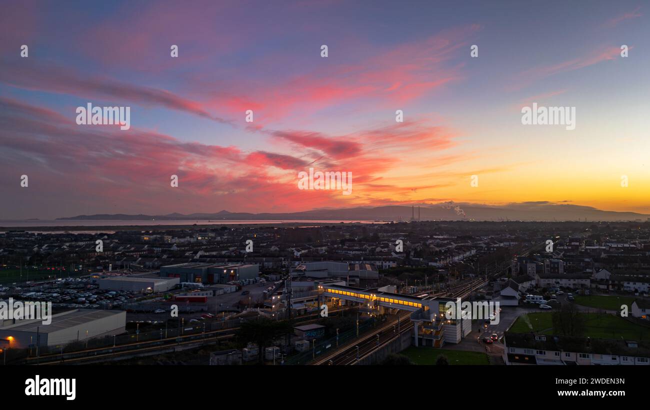 Post sunset sky over Howth Junction & Donaghmede station and Dublin Bay ...
