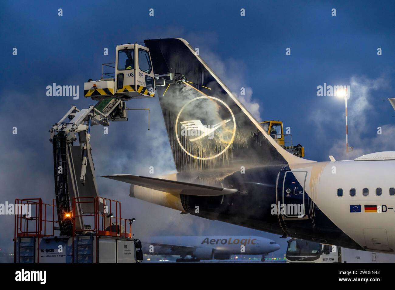 Winter at Frankfurt Main Airport, FRA, Lufthansa aircraft being de-iced ...