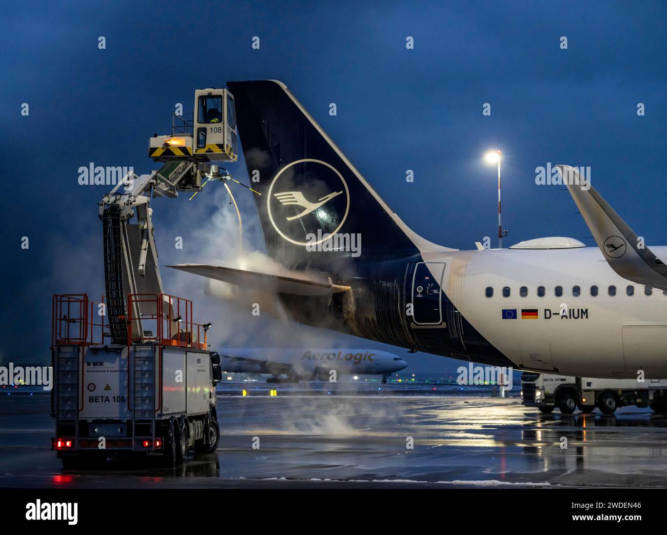 Winter at Frankfurt Main Airport, FRA, Lufthansa aircraft being de-iced ...