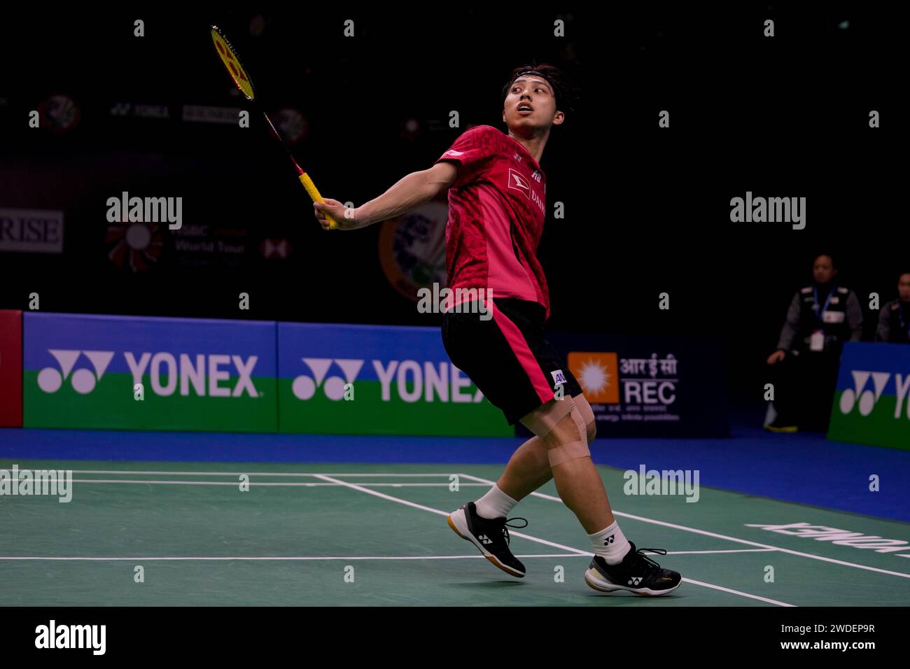 Japan's Kodai Naraoka returns a shot as he competes against Singapore's ...