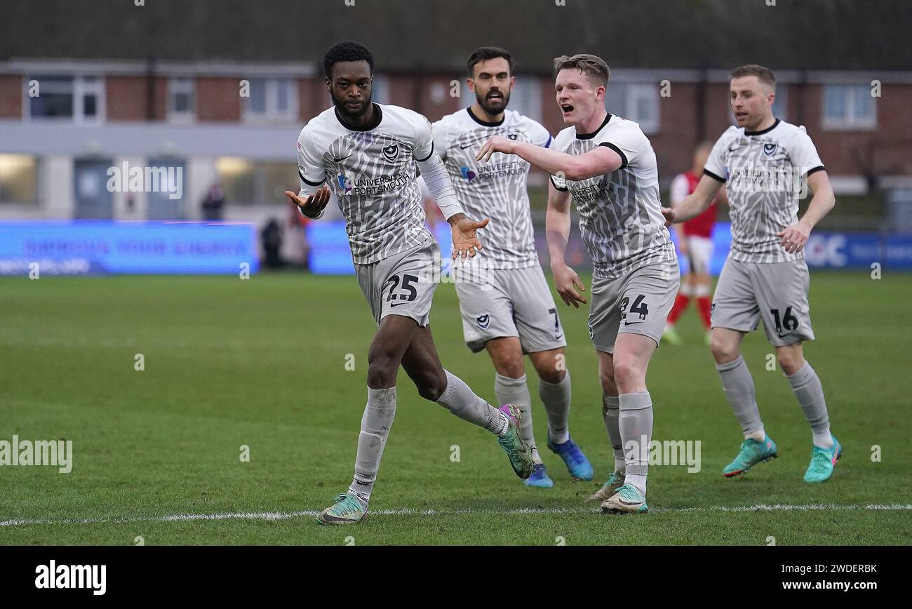 Portsmouth's Abu Kamara (left) celebrates scoring his teams first goal ...