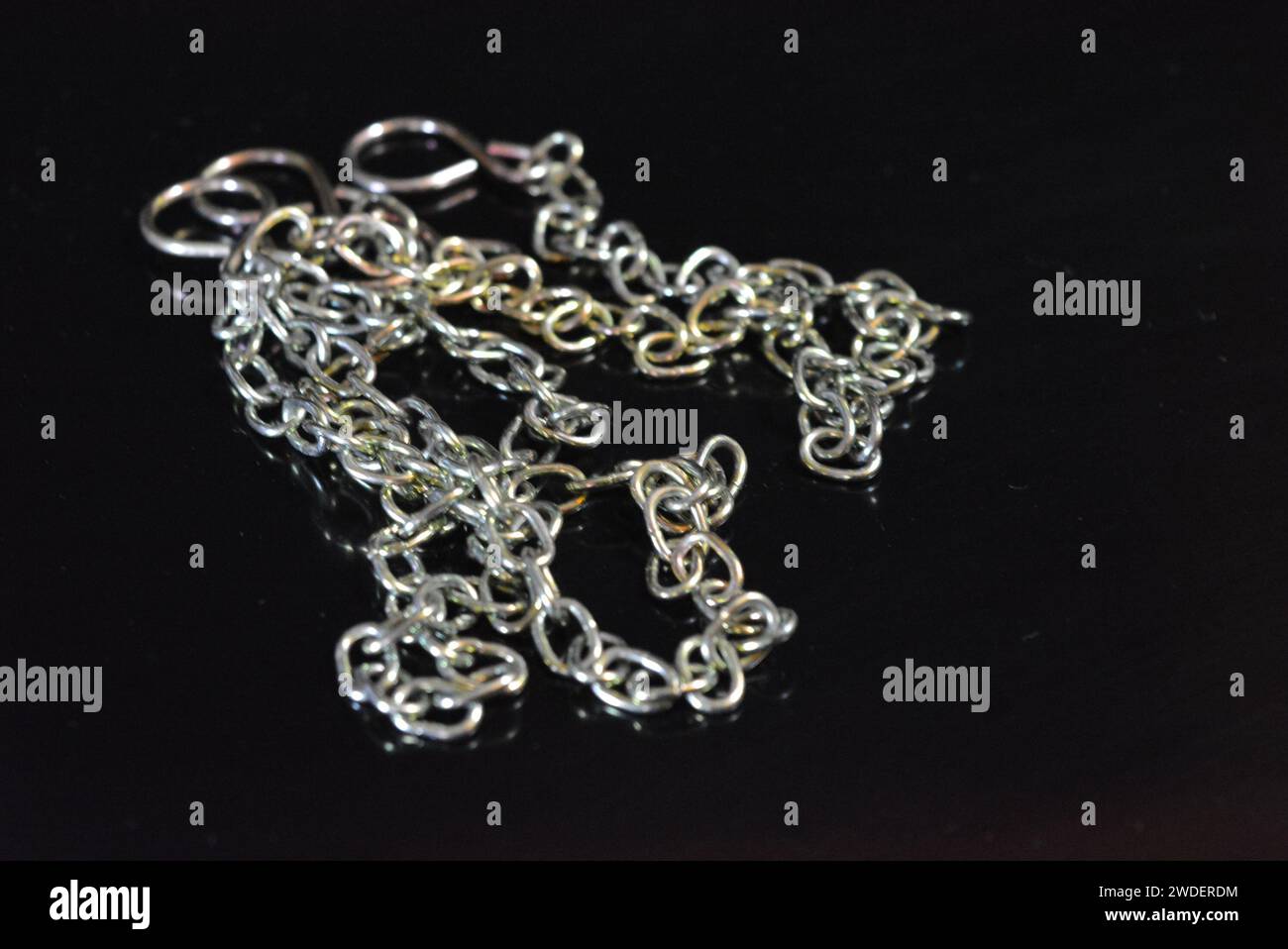 Home furnishings, metal chains of different types and styles arranged ...