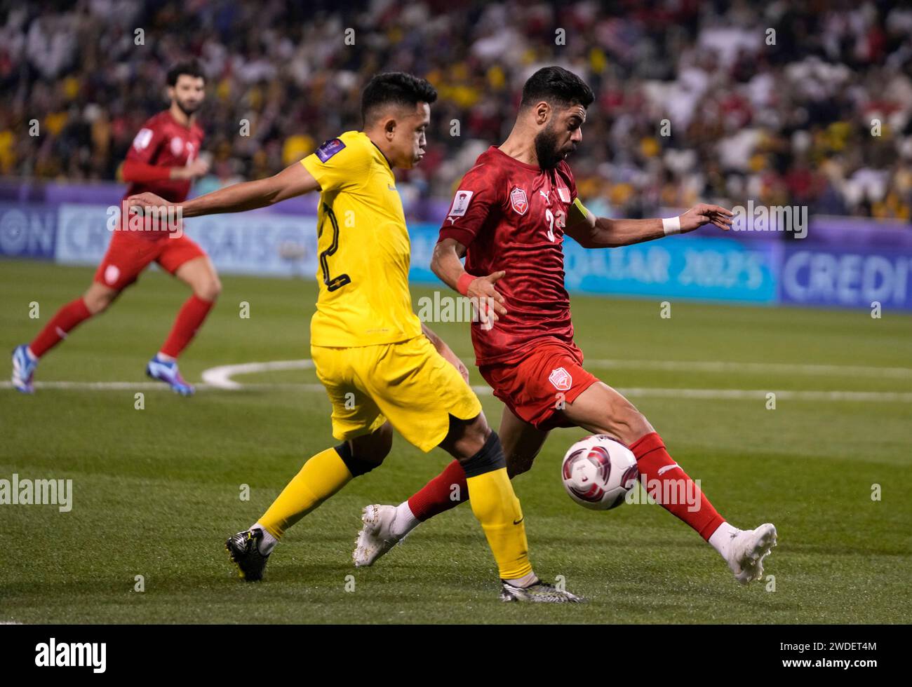 Malaysia's Arif Aiman Hanapi, left, and Bahrain's Waleed Alhayam vie ...