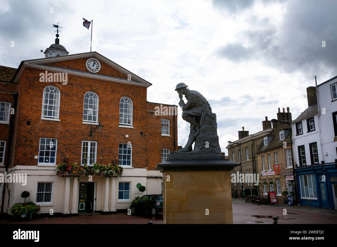 The War Memorial showing 'The Thinking Soldier', and Town Hall ...