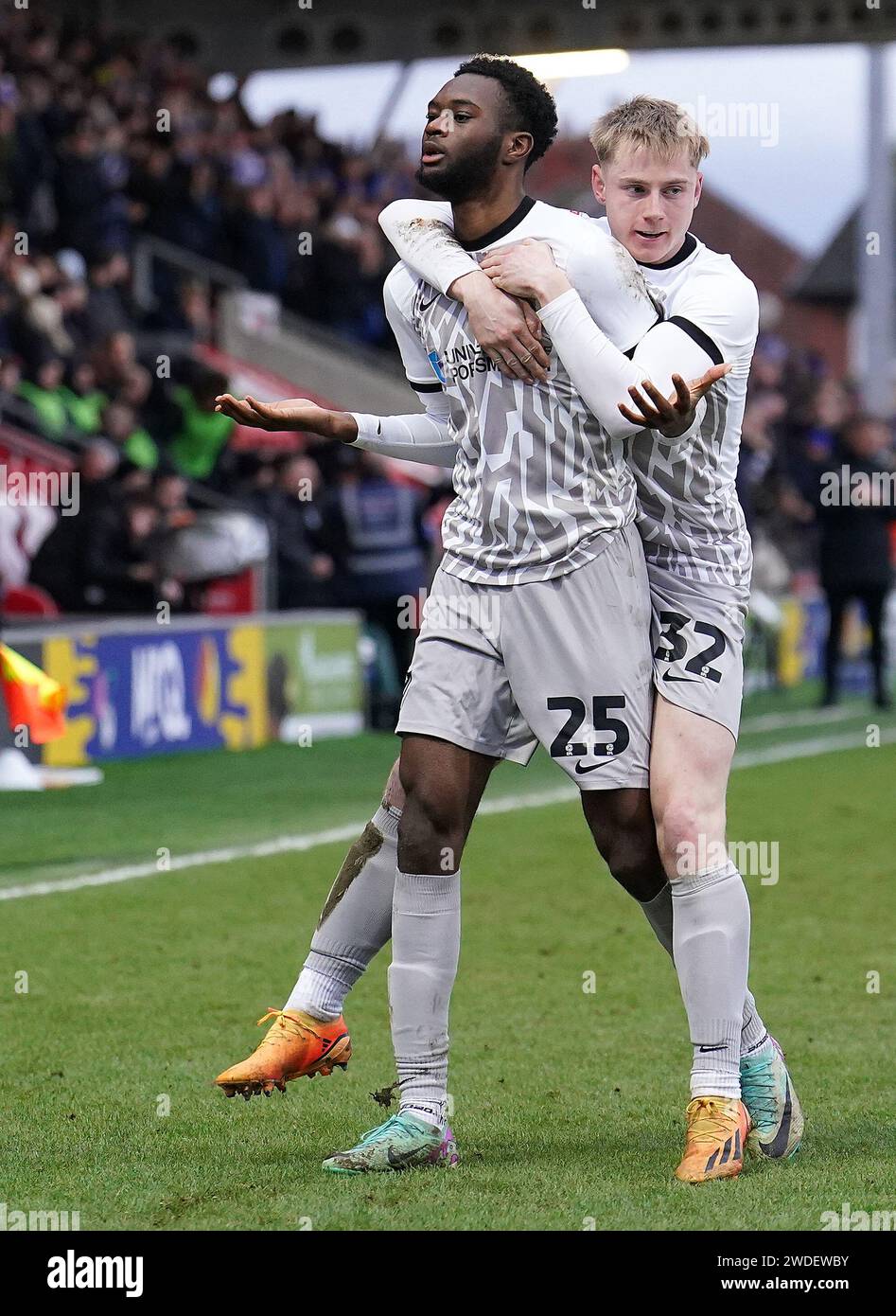 Portsmouth's Abu Kamara (left) celebrates scoring his teams first goal ...