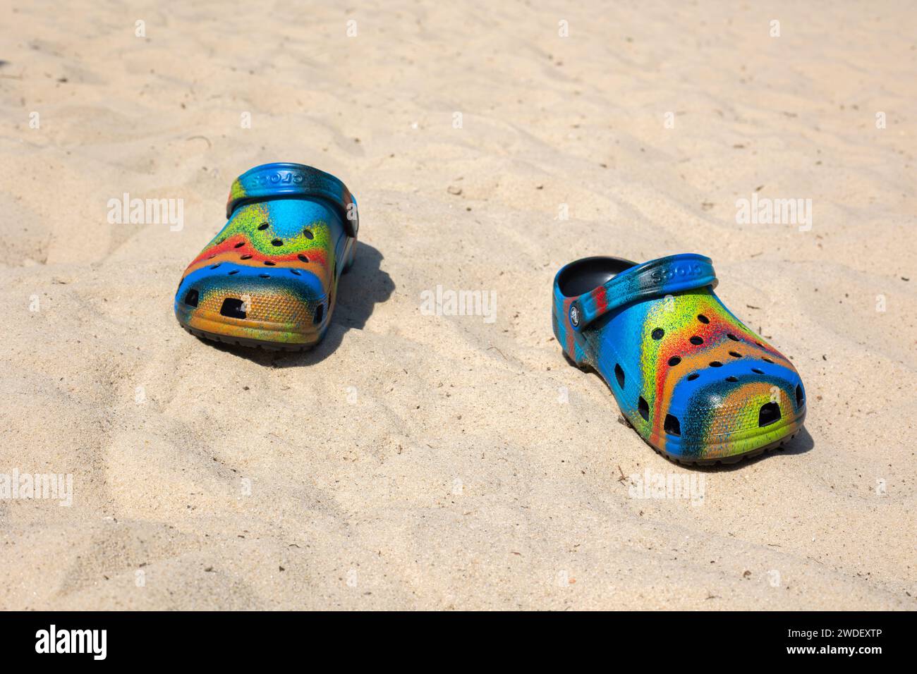 Ukraine, Kyiv - July 04. 2022: Сolorful crocs footwear on the beach ...