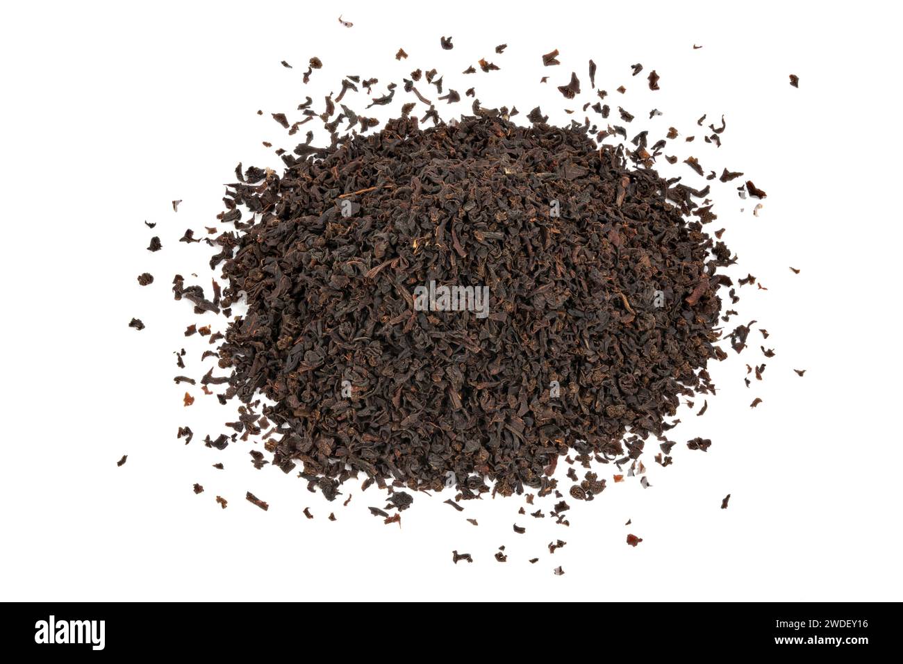 Dry black tea leaves isolated on white background. Black Ceylon tea ...