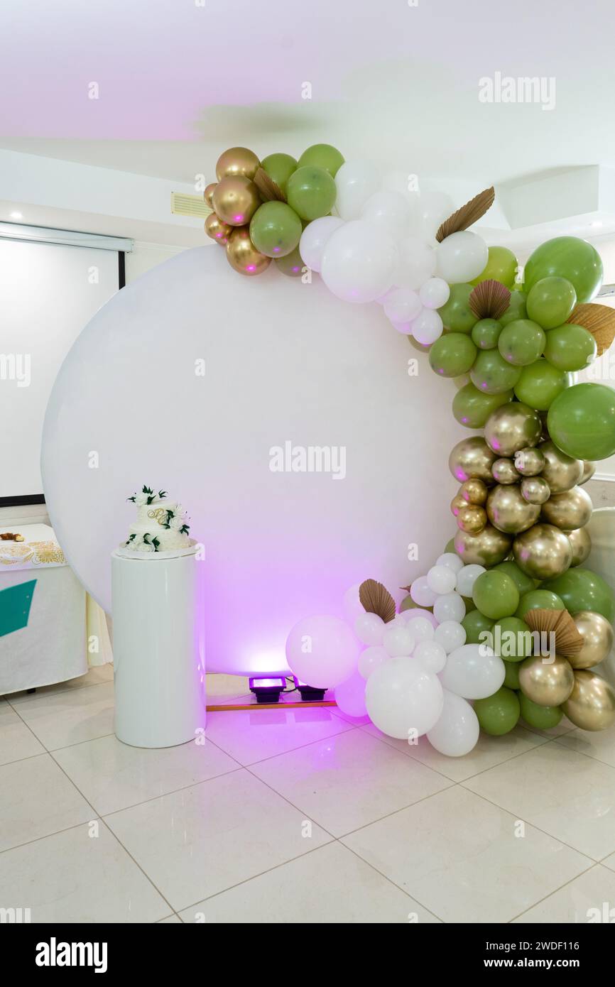 The white photo zone is decorated with balloons Stock Photo - Alamy