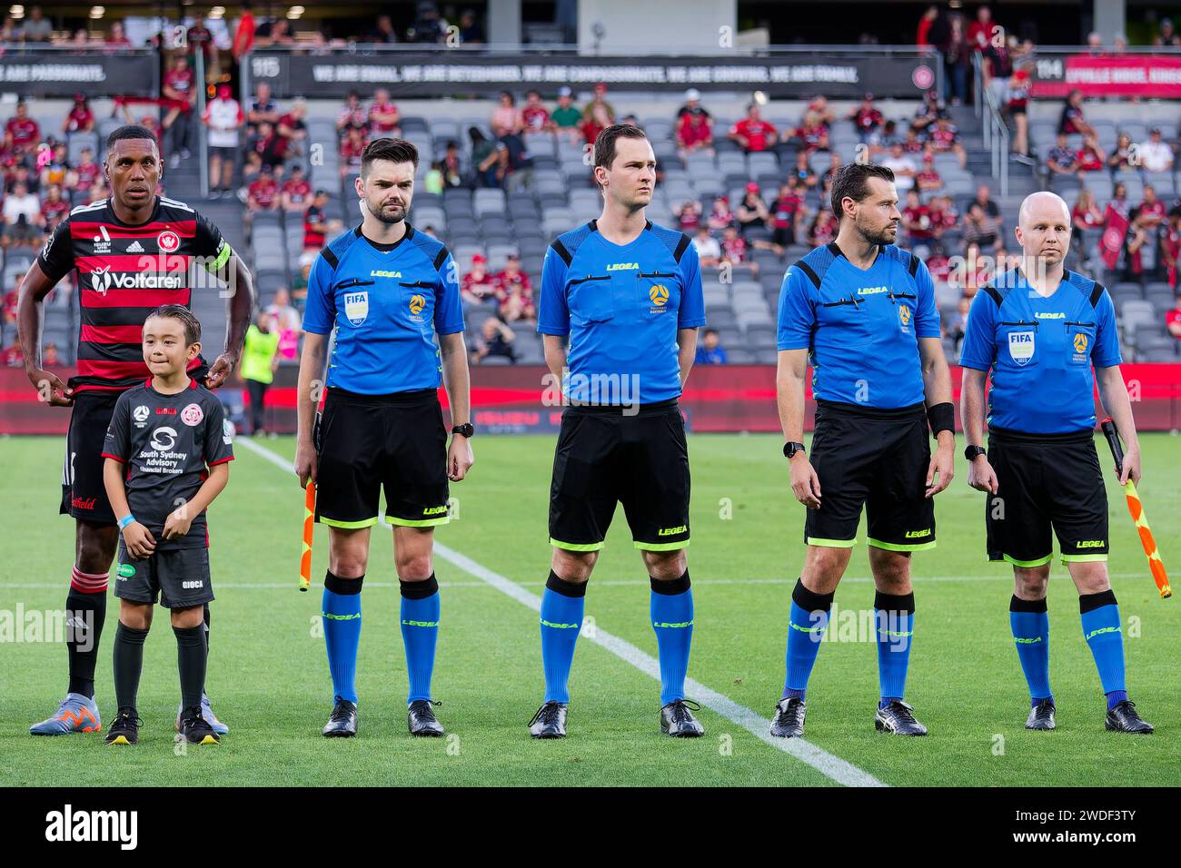 Sydney, Australia. 20th Jan, 2024. Match referees line up on the pitch ...