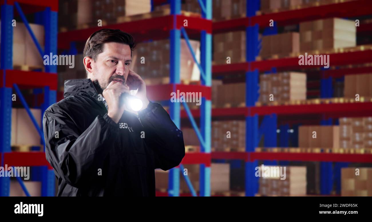 Security Guard Man At Night With Flashlight Stock Photo - Alamy
