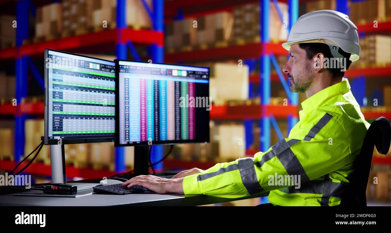 Warehouse Inventory Management On Computer. Staff In Office Stock Photo ...
