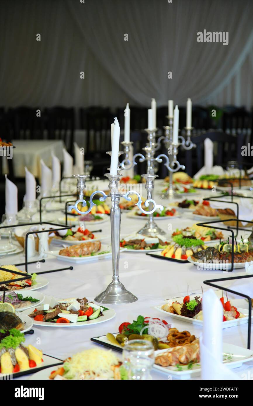 Table setting in a restaurant. Table setting with glasses, cutlery and ...